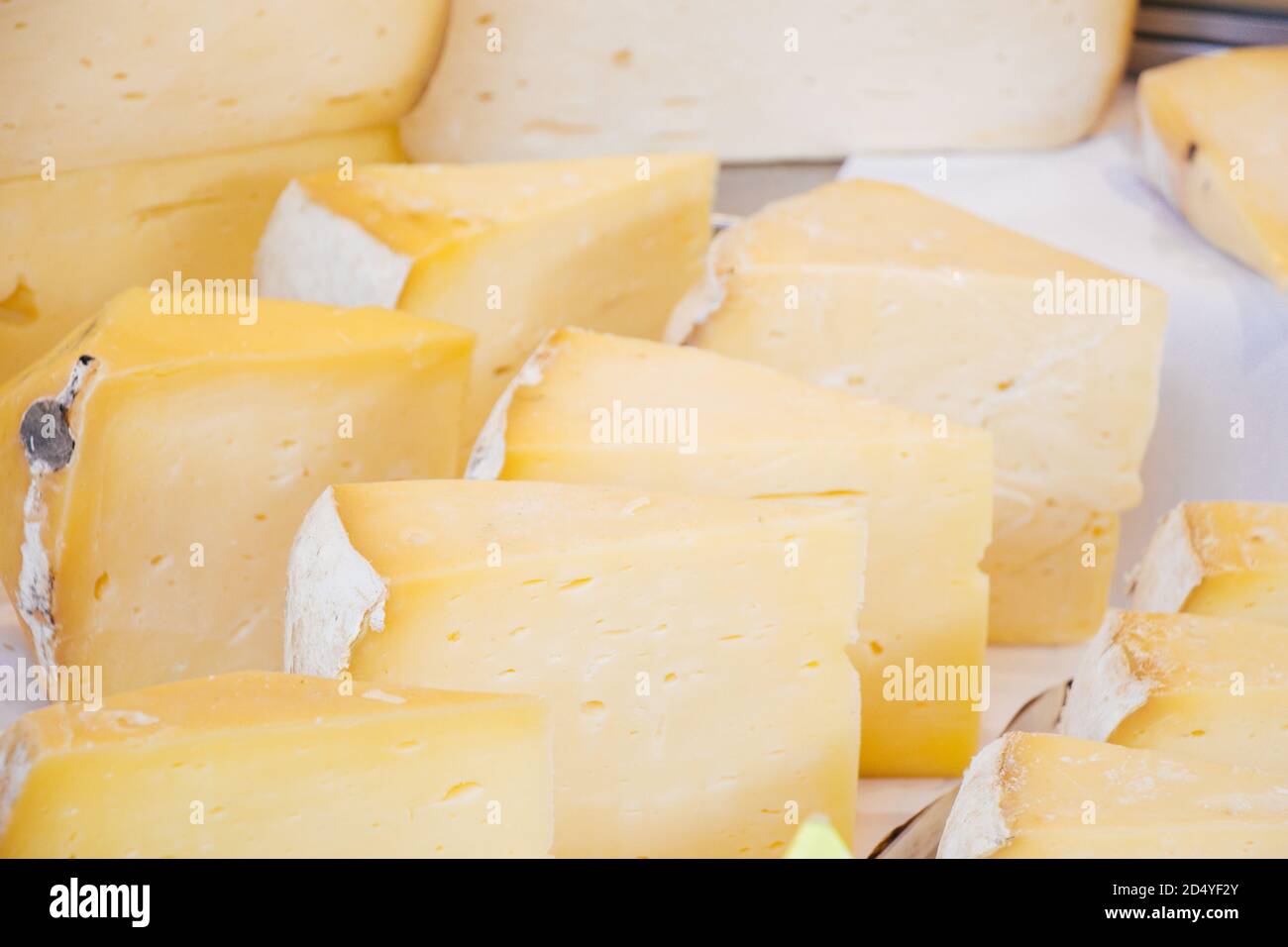 cuts of kashkaval or kasseri cheese for sale on the shelf Stock Photo ...