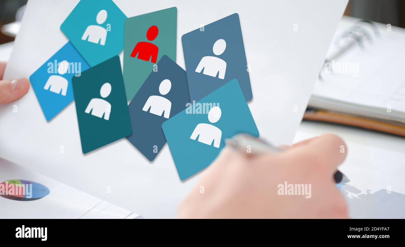 Hands holding a paper showing a leadership concept Stock Photo - Alamy