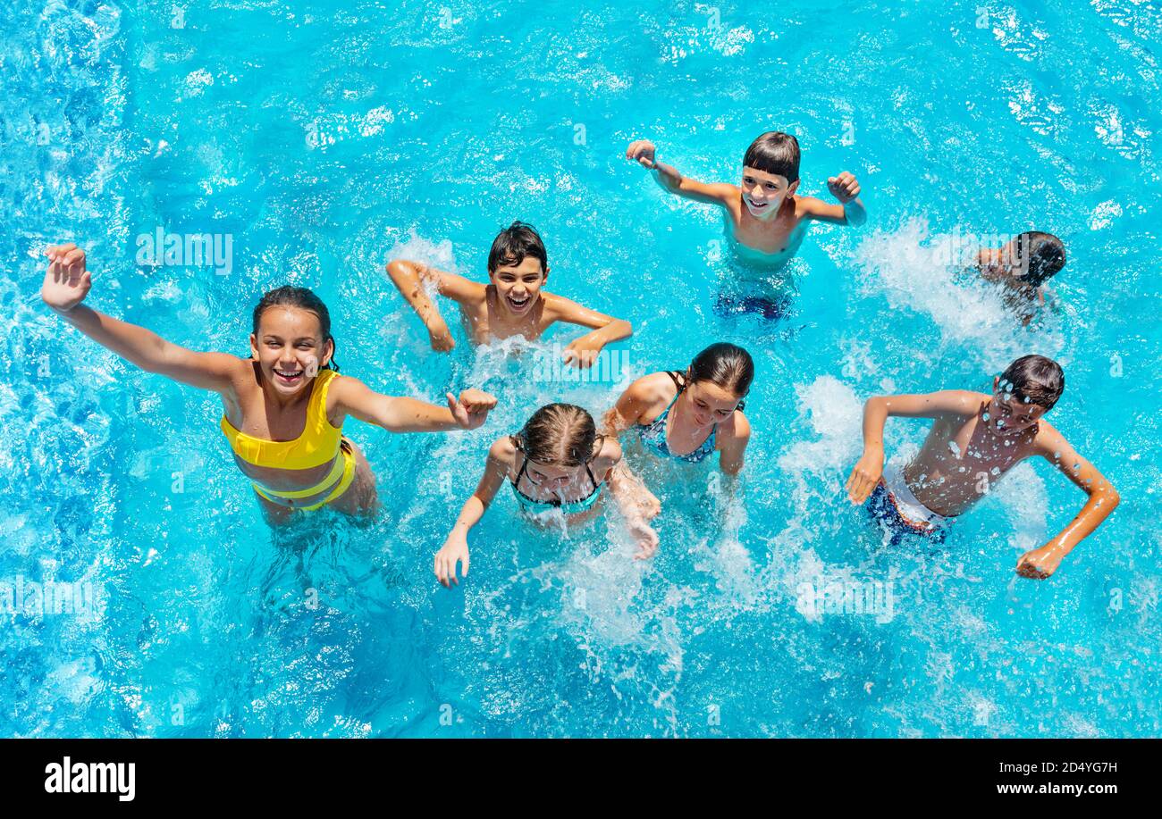 Children group splashing kids splash hi-res stock photography and ...