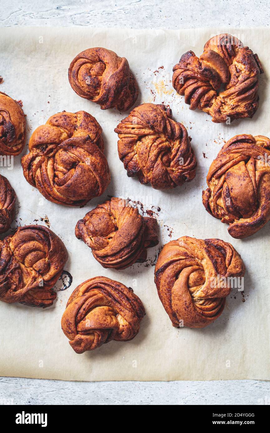 Swedish buns with cardamom and cinnamon, light background. Scandinavian ...