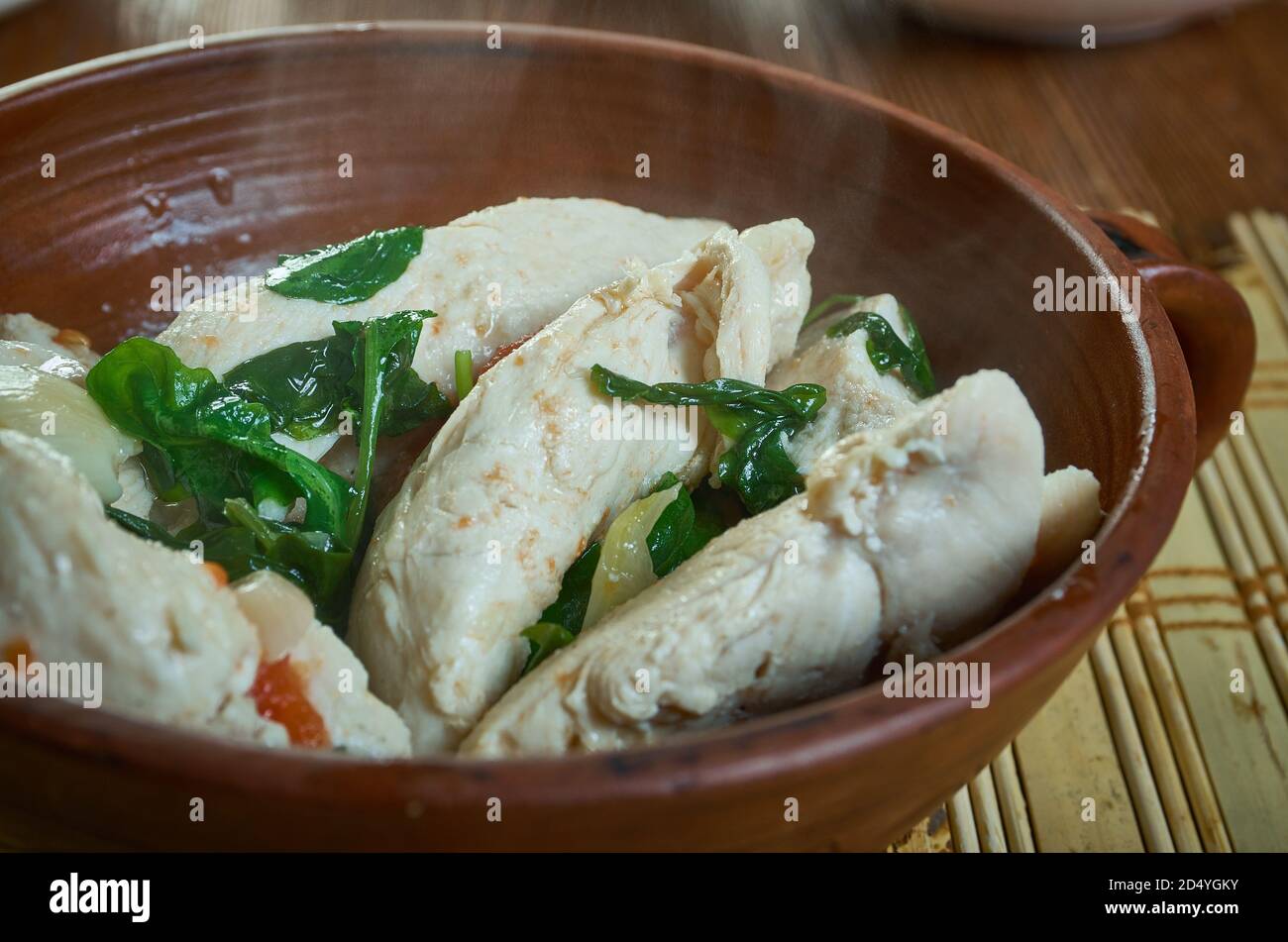 Poulet fafa - traditional chicken Tahitian dish Stock Photo - Alamy