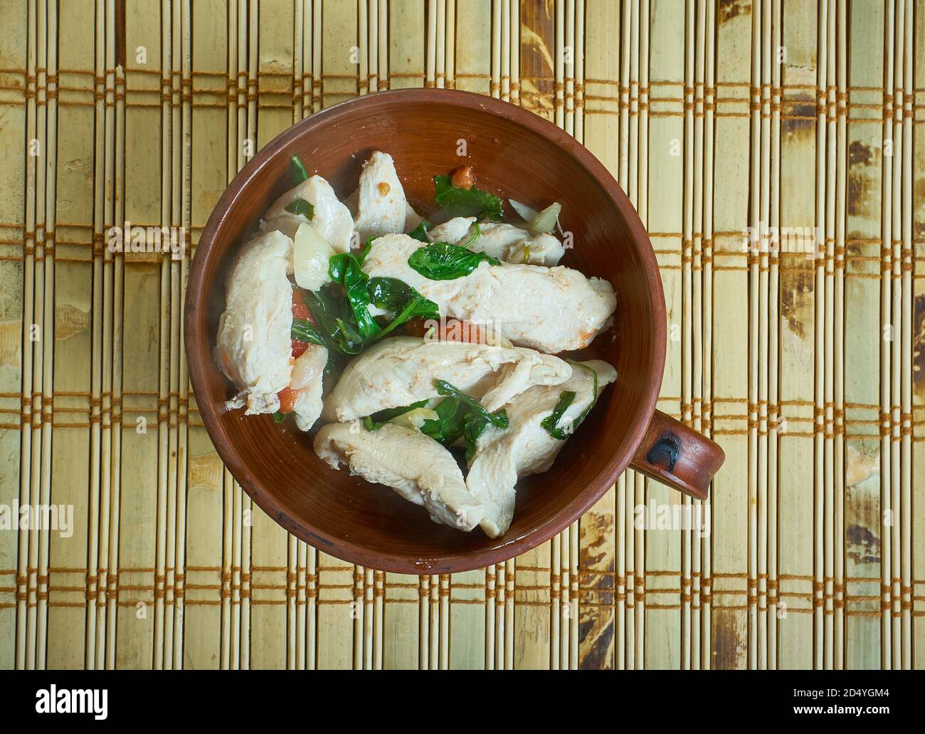 Poulet fafa - traditional chicken Tahitian dish Stock Photo - Alamy