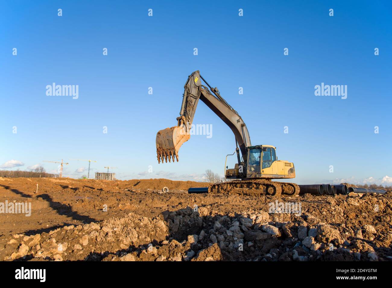 Crawler excavator at a construction site during digging ground for ...
