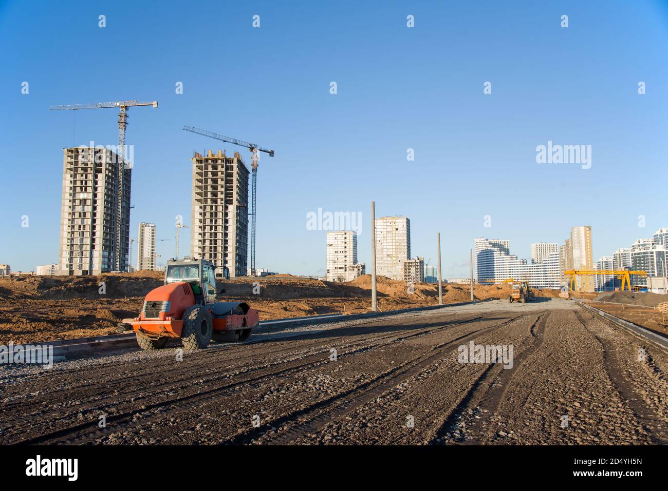 Soil Compactor during road construction at the large scale construction ...