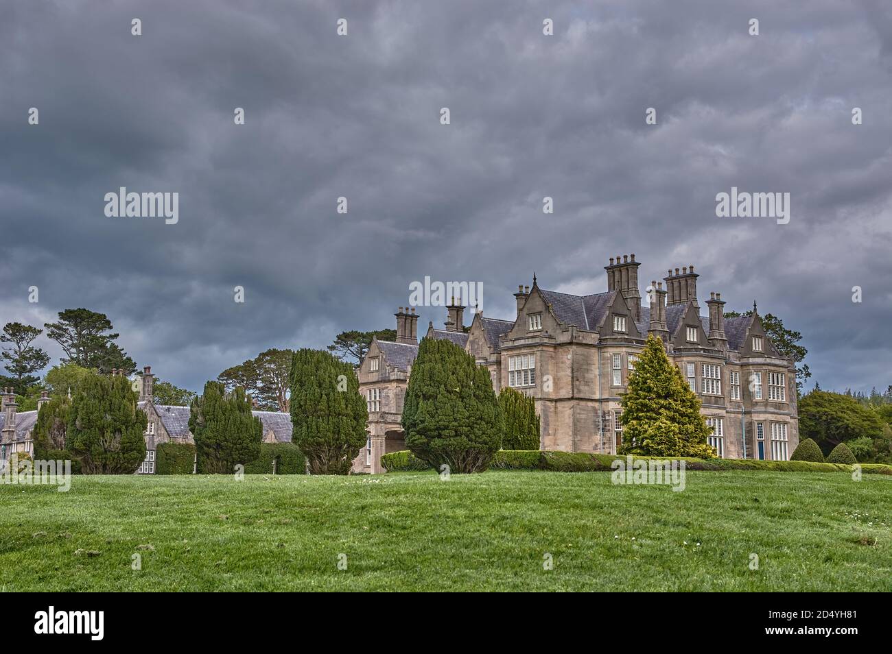 Dark sky above a mansion at the Ring of Kerry, Ireland. Muckross house ...