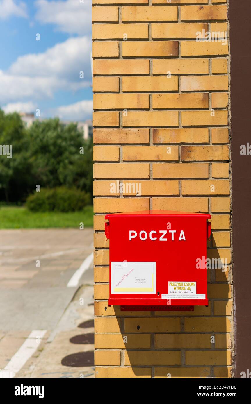 POZNAN, POLAND - Aug 07, 2017: Red Poczta Polska mailbox on a wall ...