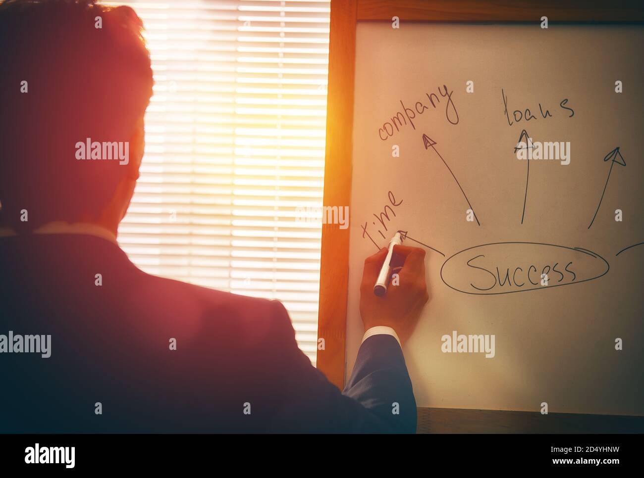 Businessman writing whiteboard conference room hi-res stock photography ...
