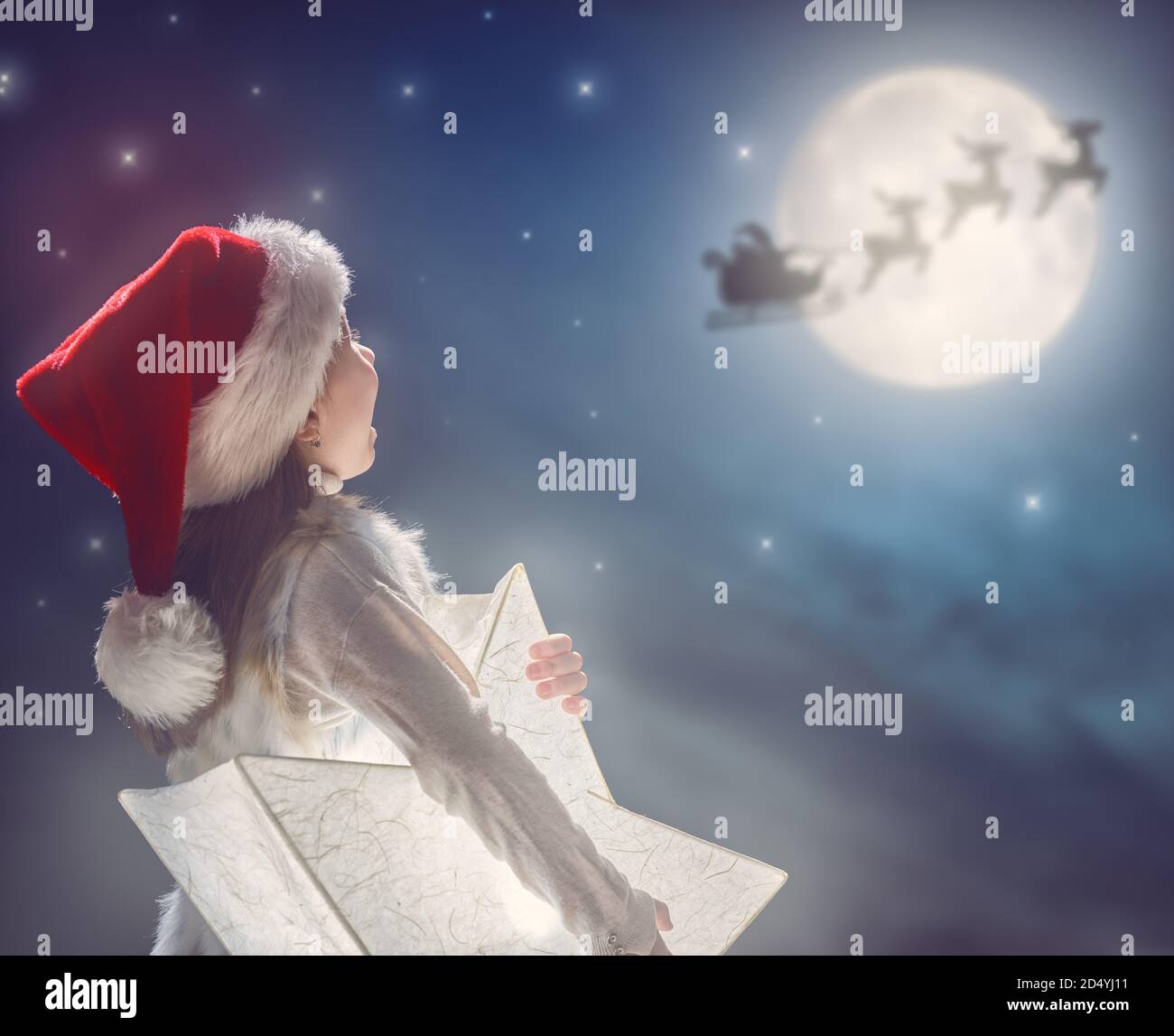 Merry Christmas and happy holidays! Cute little child girl with xmas ...