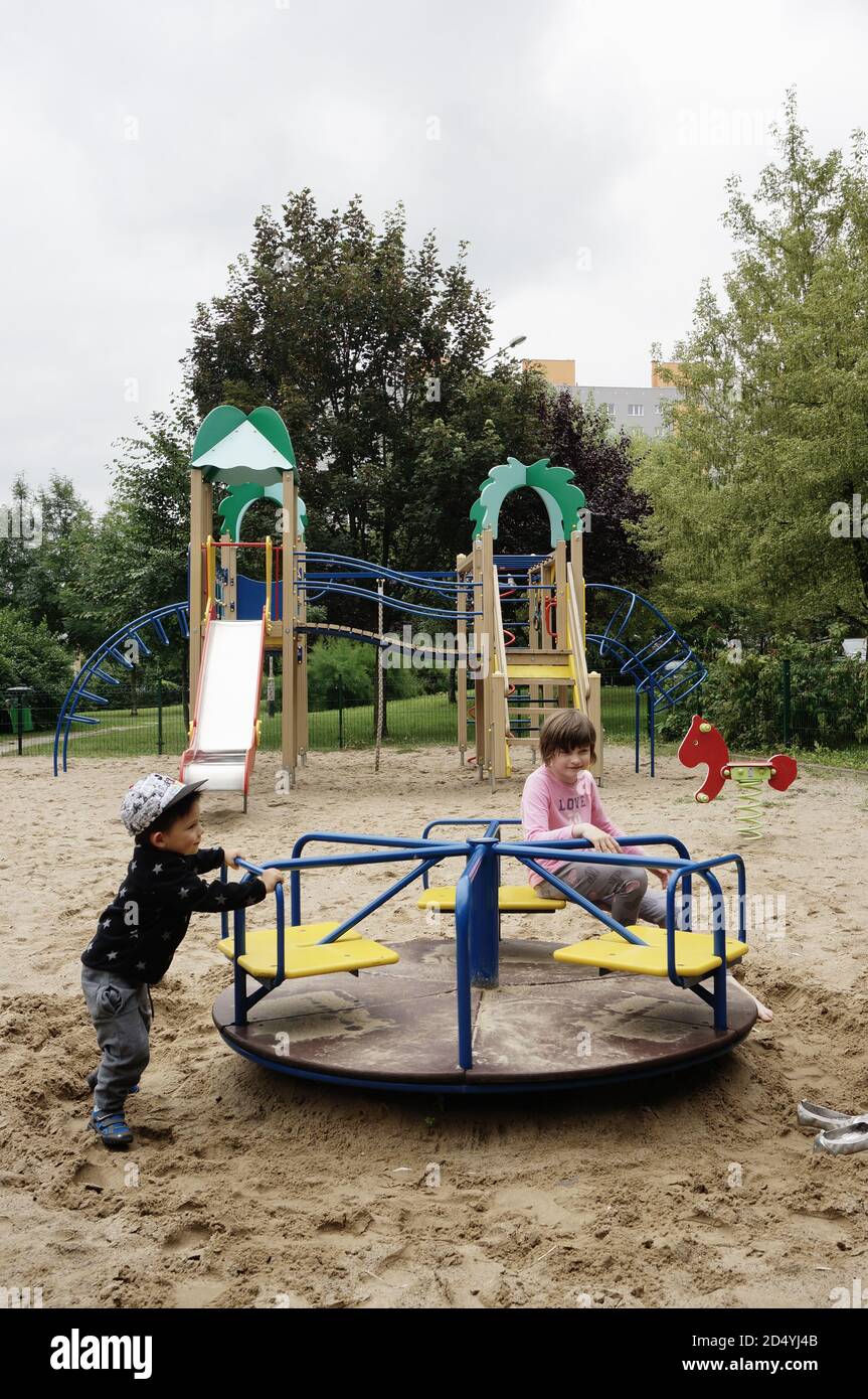 Kids playground playing roundabout kids playground playing roundabout ...