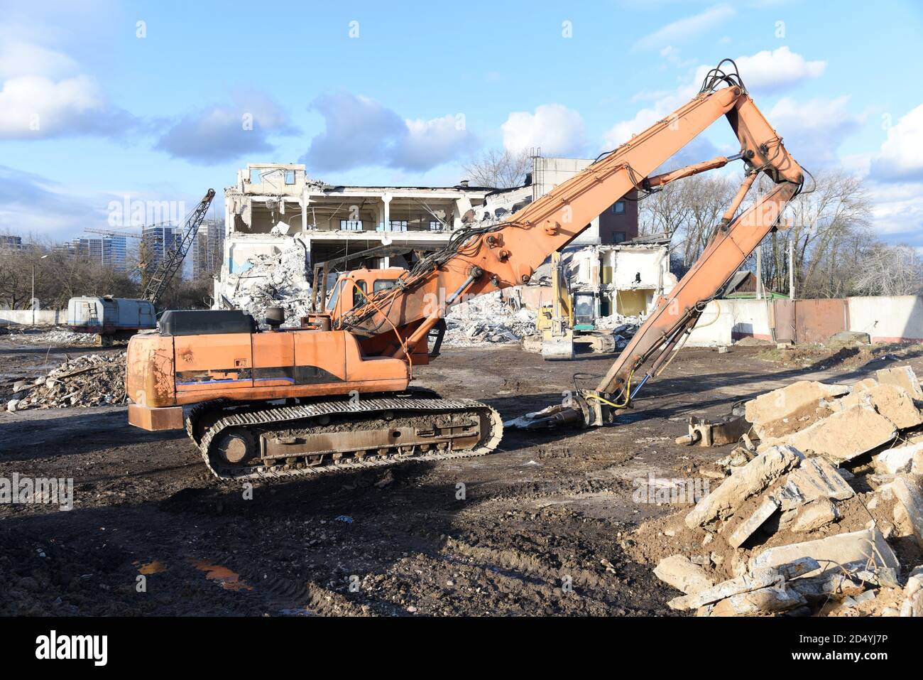 High Reach Excavator machines for demolition of tall building. Machine ...