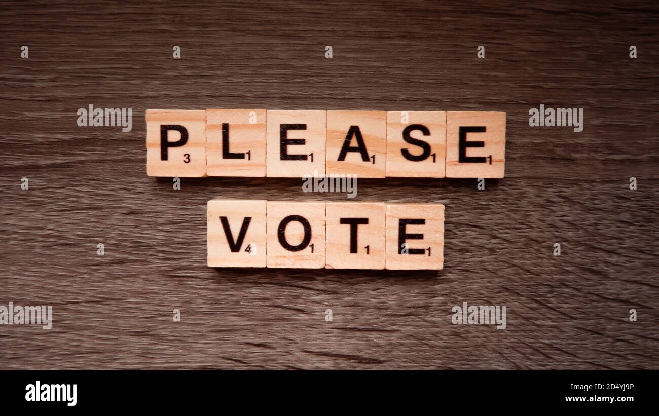 VOTE word text on face mask background Stock Photo - Alamy