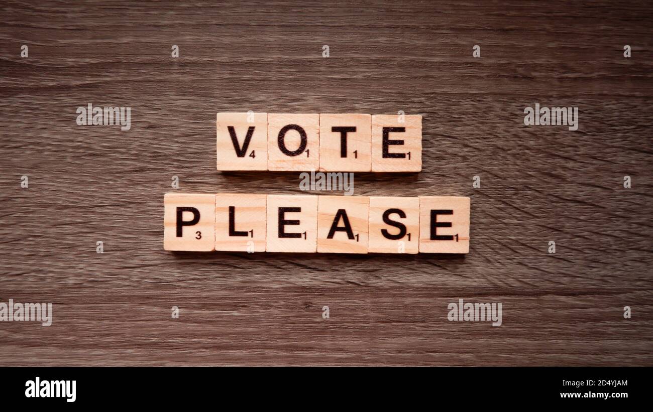 VOTE word text on face mask background Stock Photo - Alamy