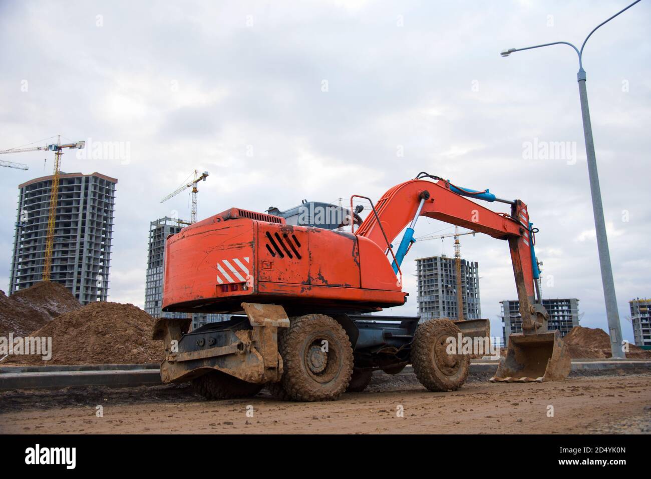 Hydraulic excavator installing pipeline hi-res stock photography and ...