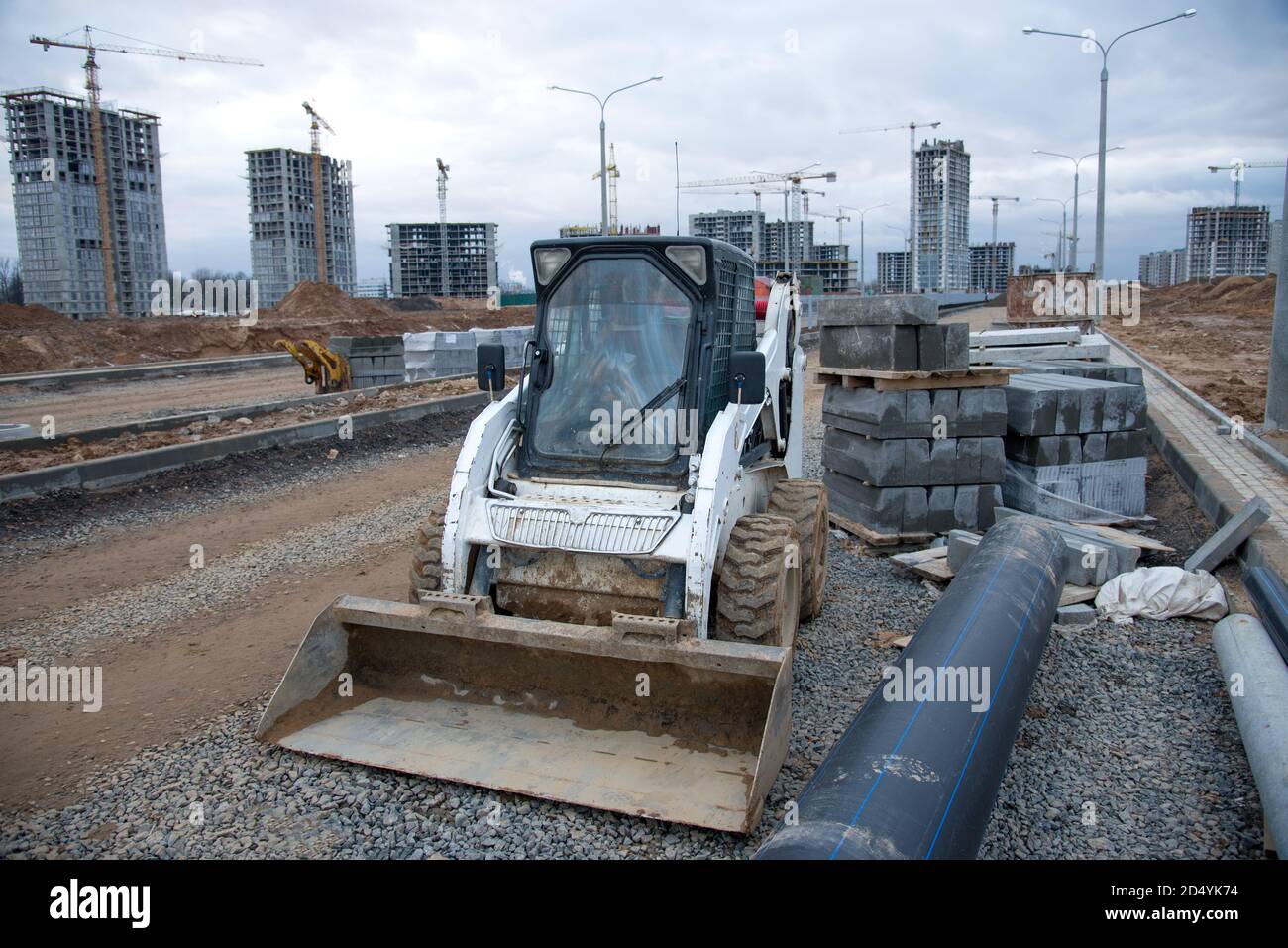 Road works tractor with front loader hi-res stock photography and ...