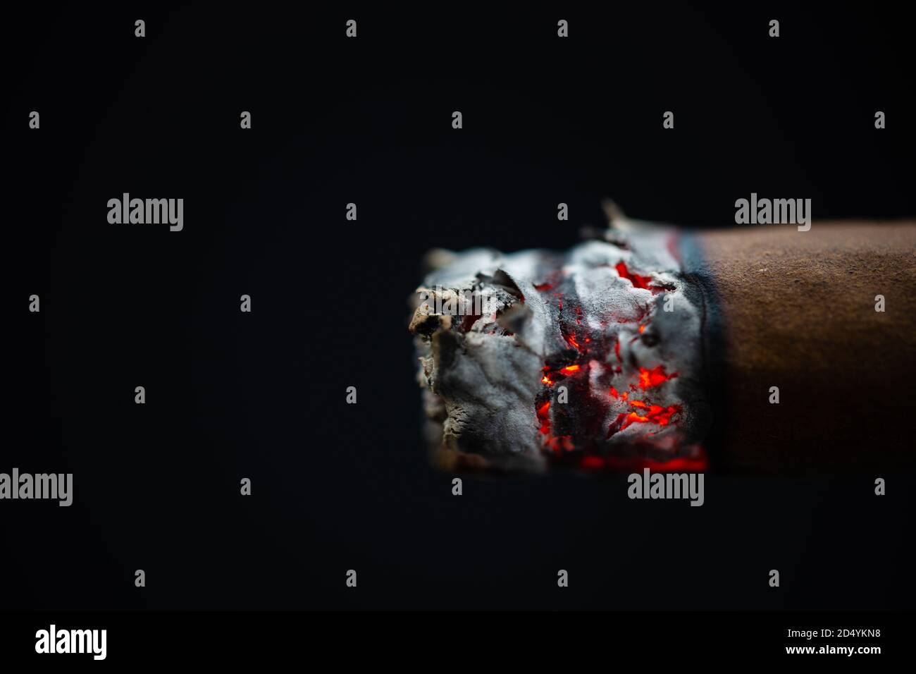 burning cigarillo, cigar in close-up, macro Stock Photo - Alamy