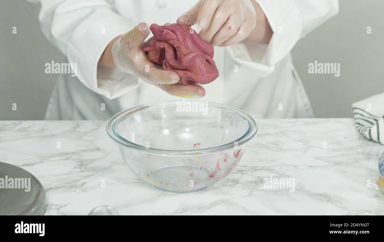 Step by step. Mixing food coloring into the cookie dough to bake red ...