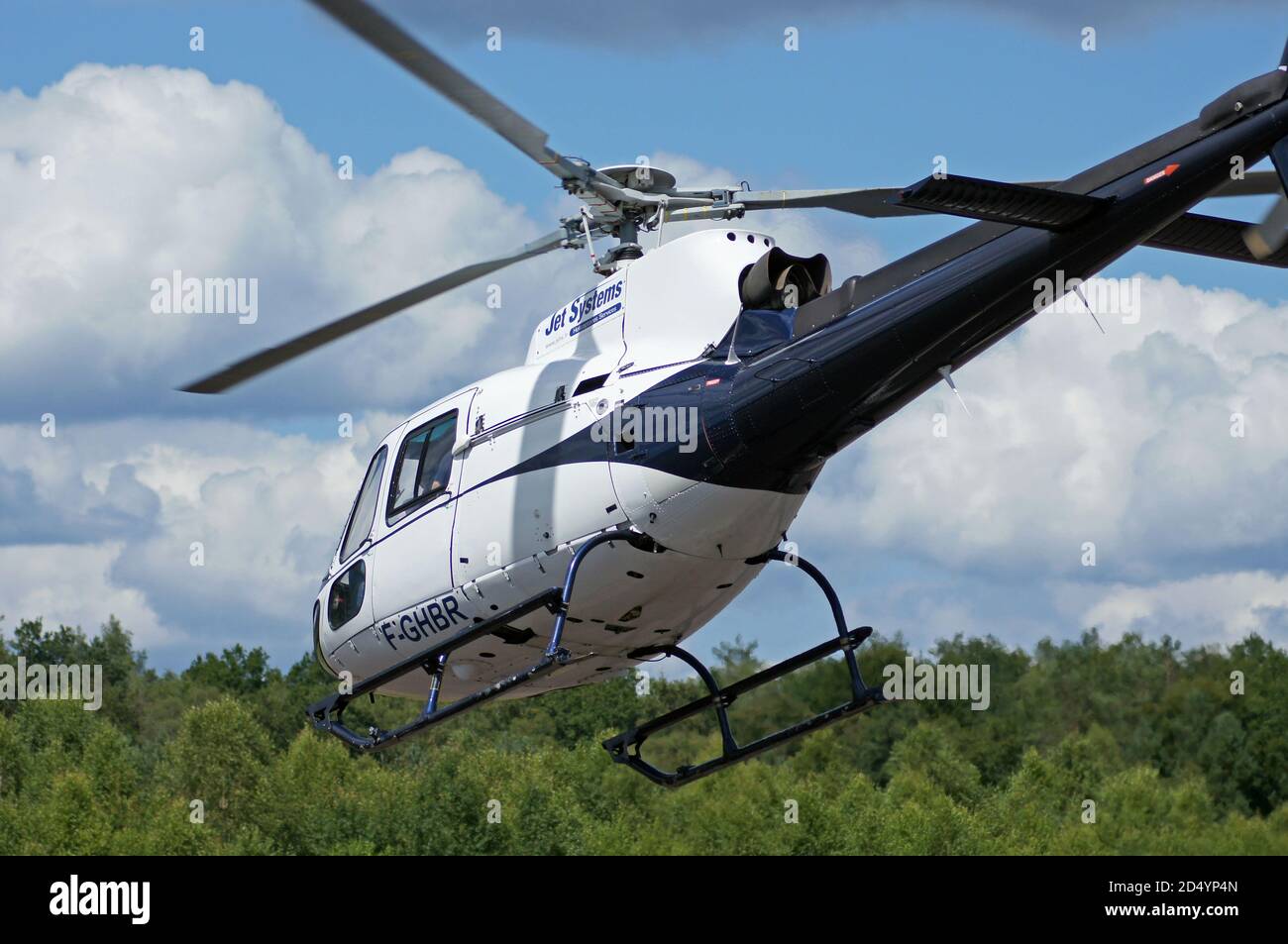 An Aerospatiale AS350 B3 Ecureuil helicopter, landing at the aerodrome ...
