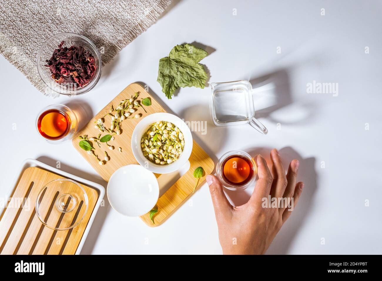 Chinese tea party. Dry granules of different types of tea. Flatlay, top ...