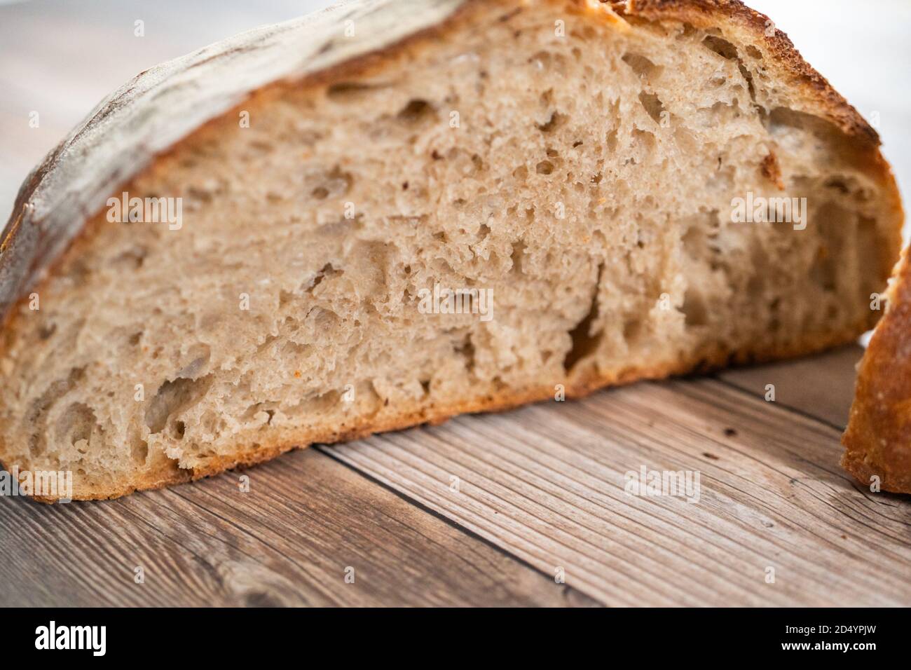 Sliced baked sourdough rye loaf of bread Stock Photo - Alamy