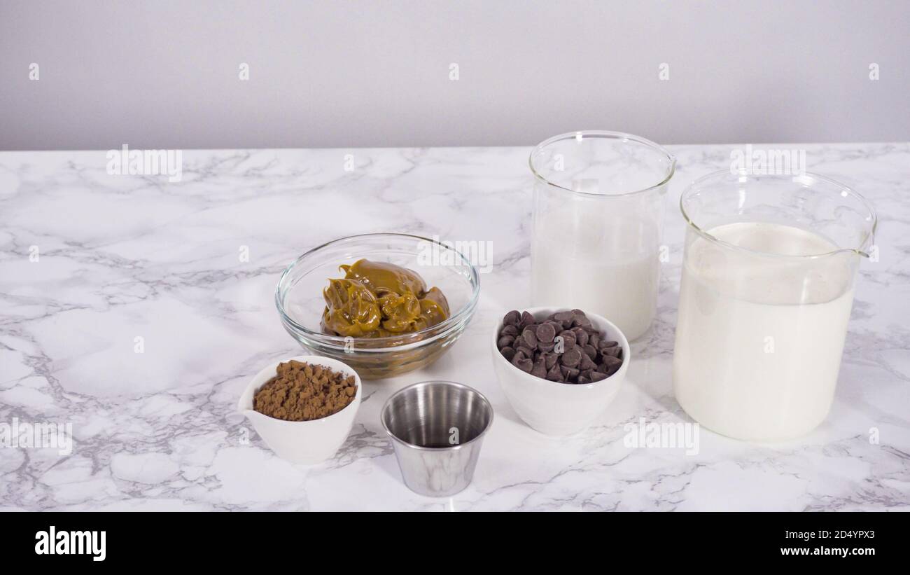 Step by step. Ingredients to make homemade chocolate ice cream Stock ...