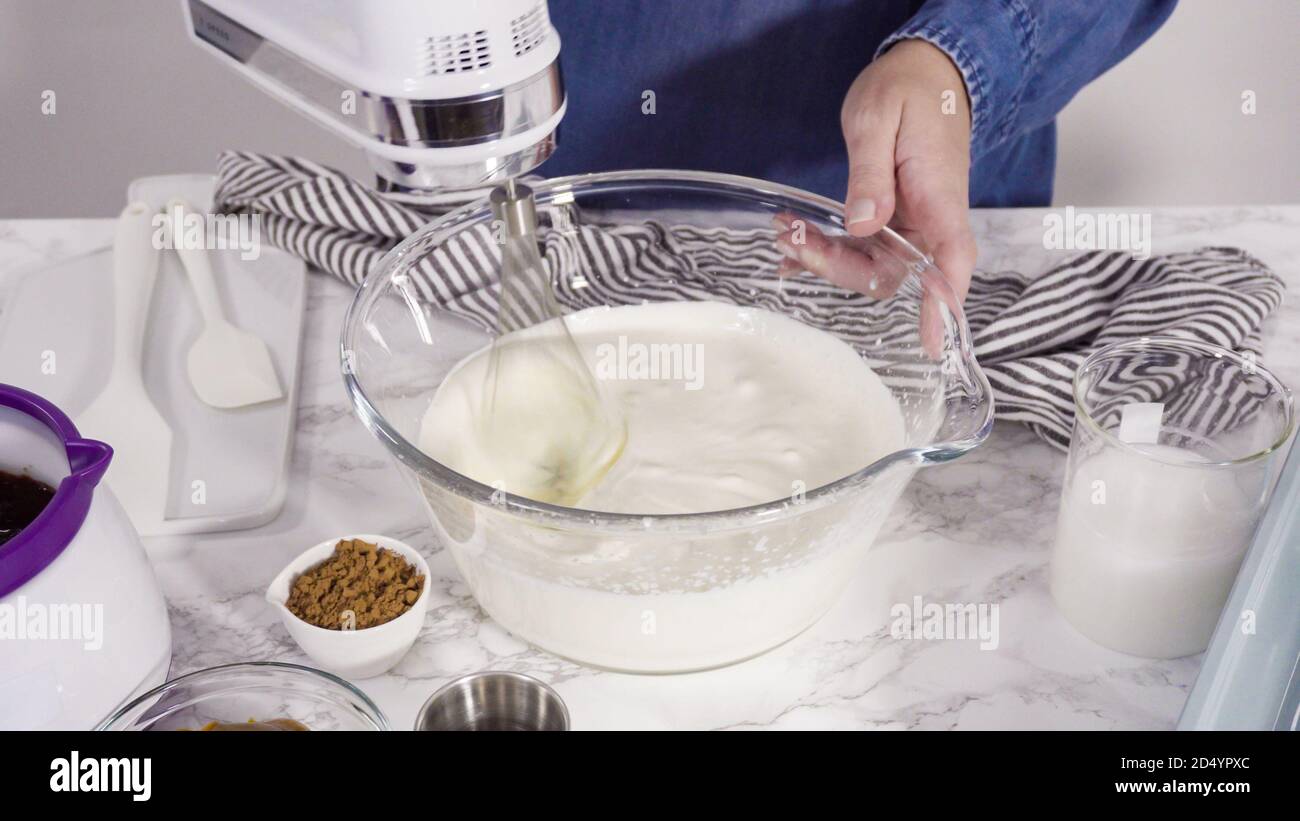 Step by step. Preparing homemade chocolate ice cream in a hand kitchen ...