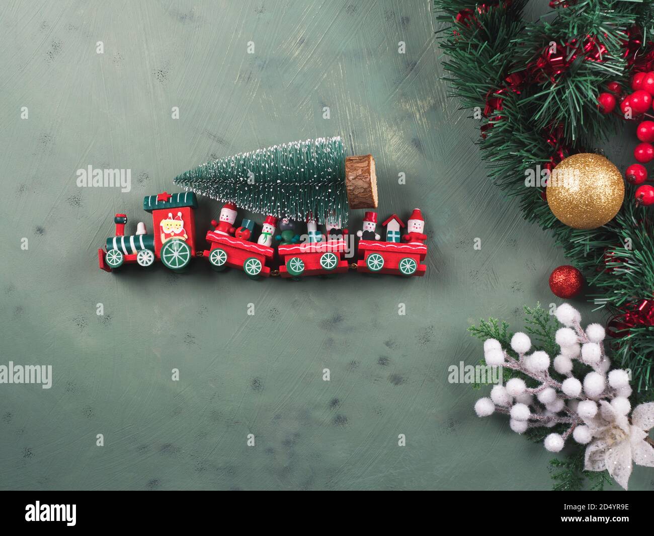 Christmas festive green background with toy train Stock Photo - Alamy