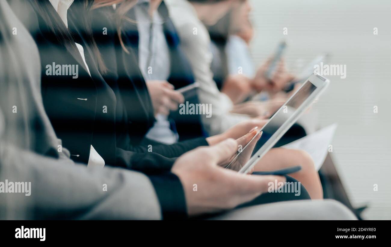 group of candidates filling out an interview form Stock Photo - Alamy