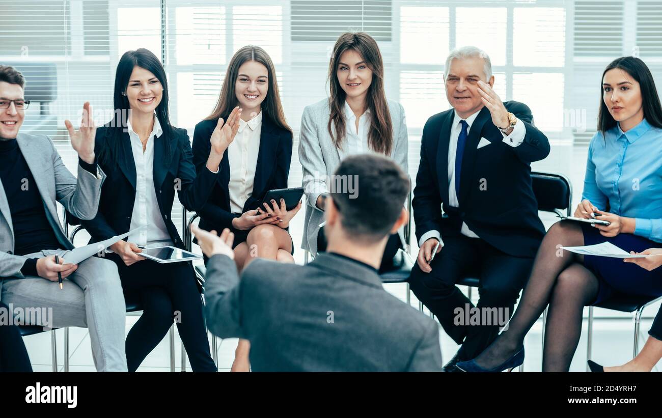 employees asking questions at a meeting with the project Manage Stock ...