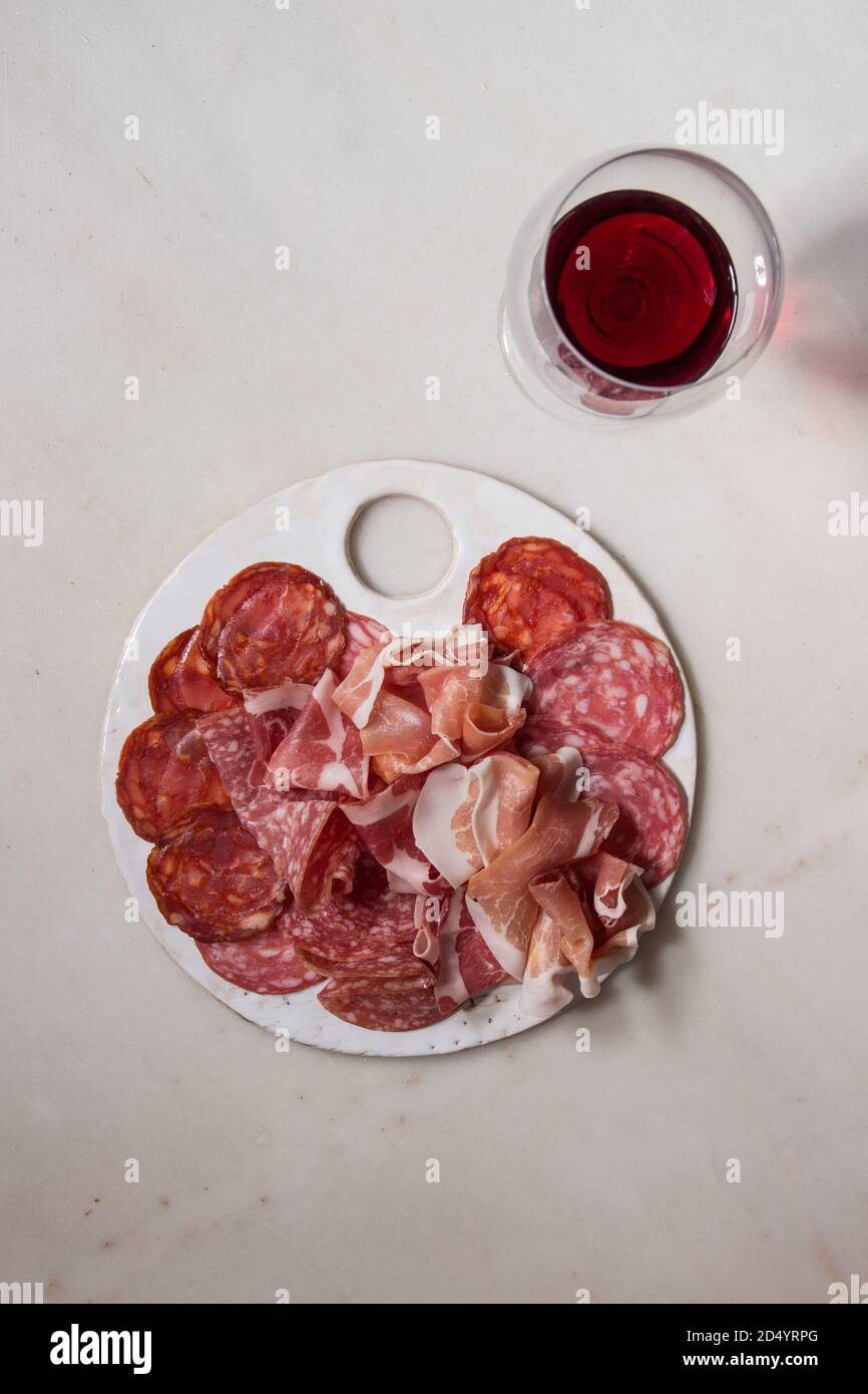 Antipasto meat platter assorti of sliced jamon, salami, chorizo sausage ...