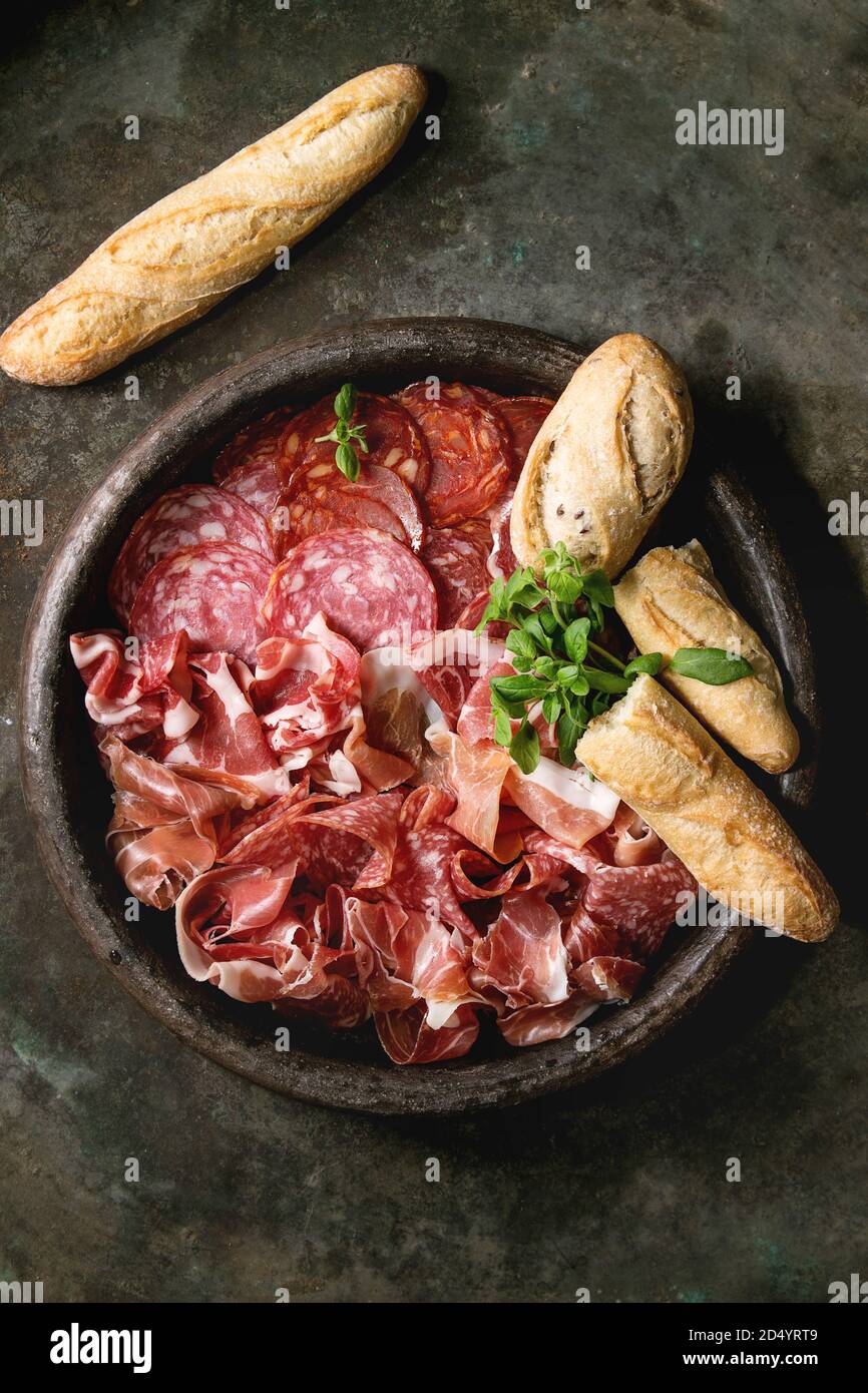 Antipasto meat platter assorti of sliced jamon, salami, chorizo sausage ...