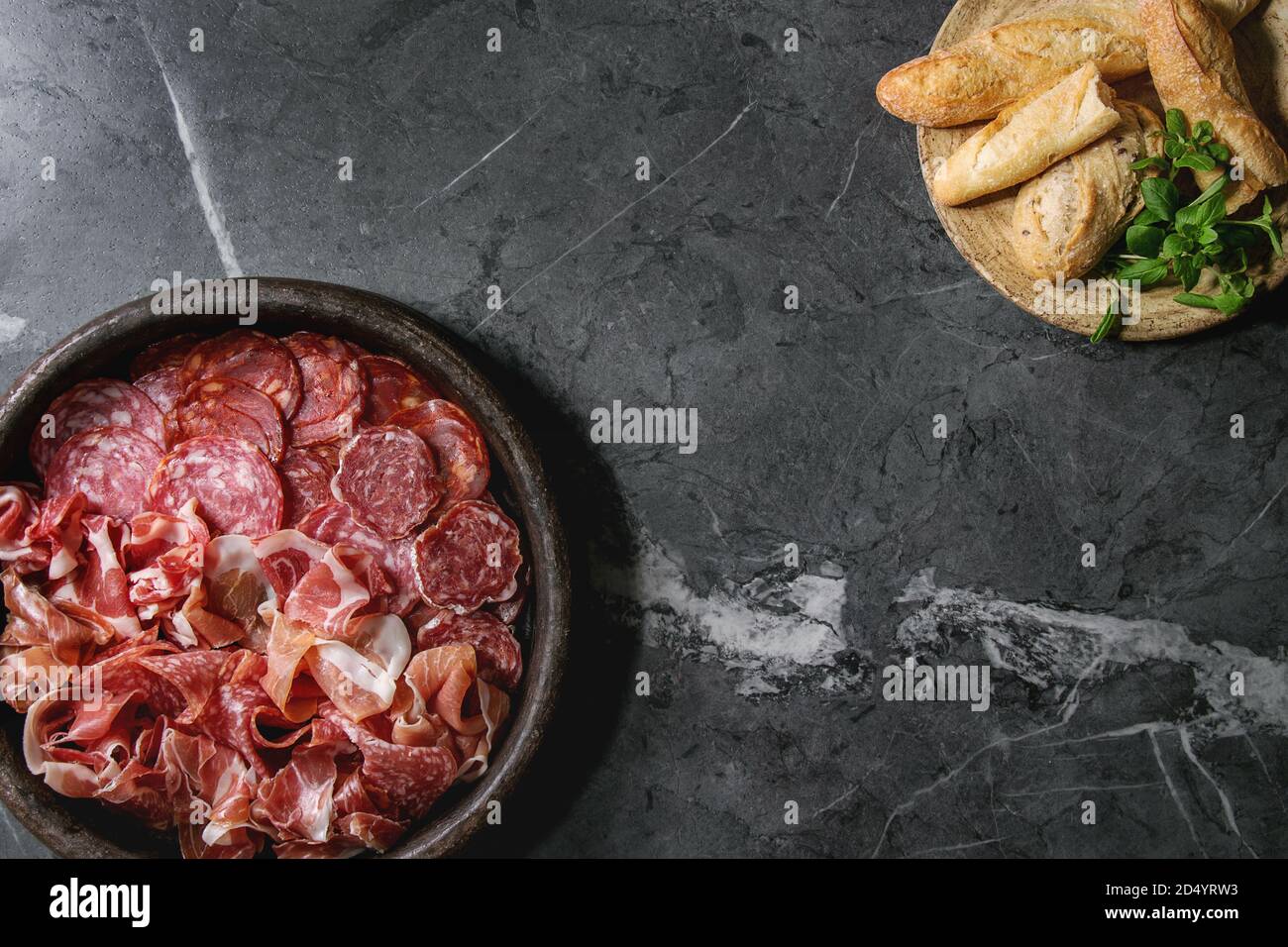 Antipasto meat platter assorti of sliced jamon, salami, chorizo sausage ...