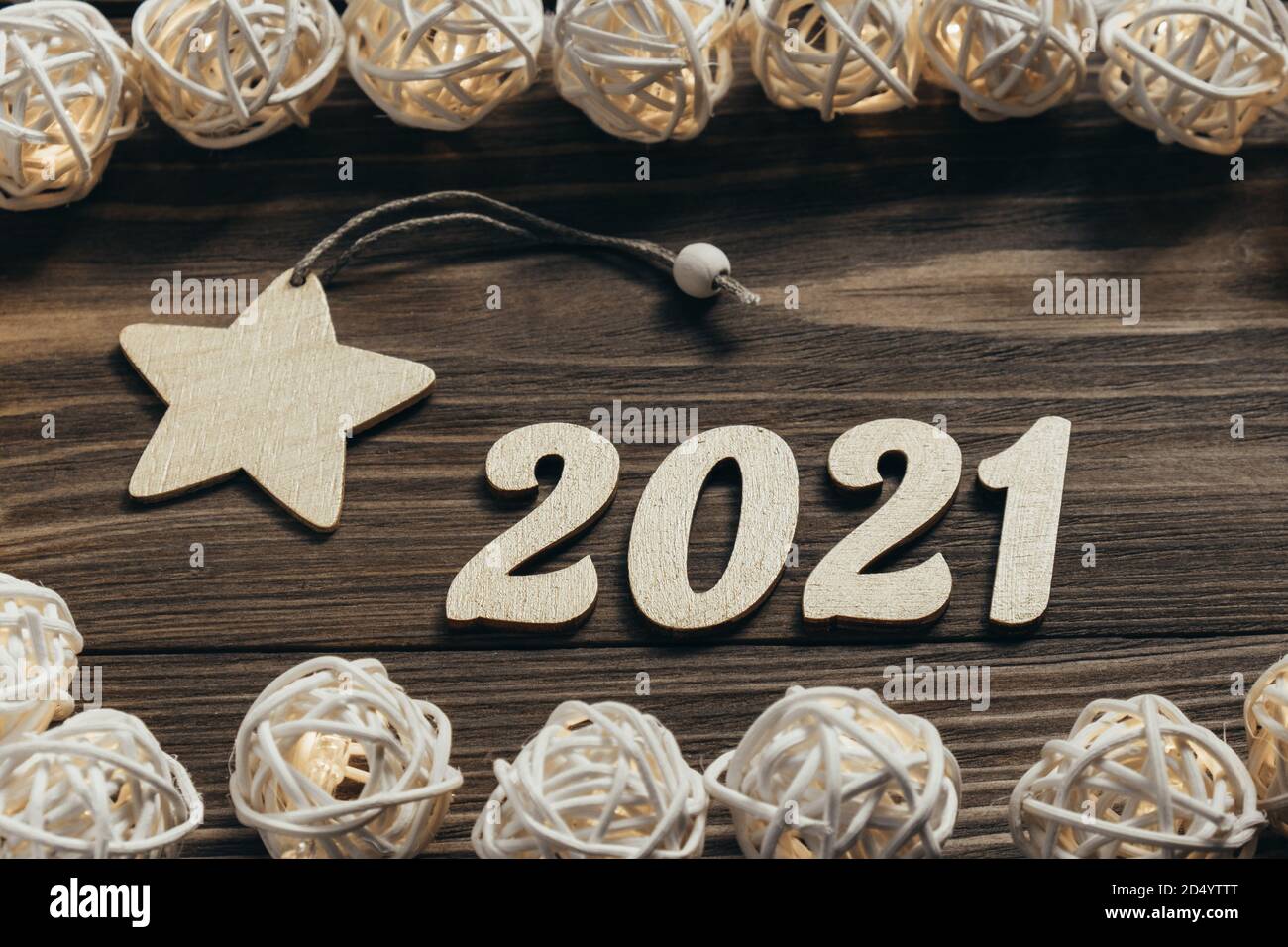Christmas banner with golden numbers, decorations and a glowing garland ...