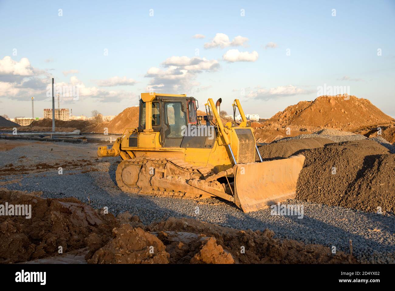 Dozer working at construction site. Bulldozer for land clearing ...