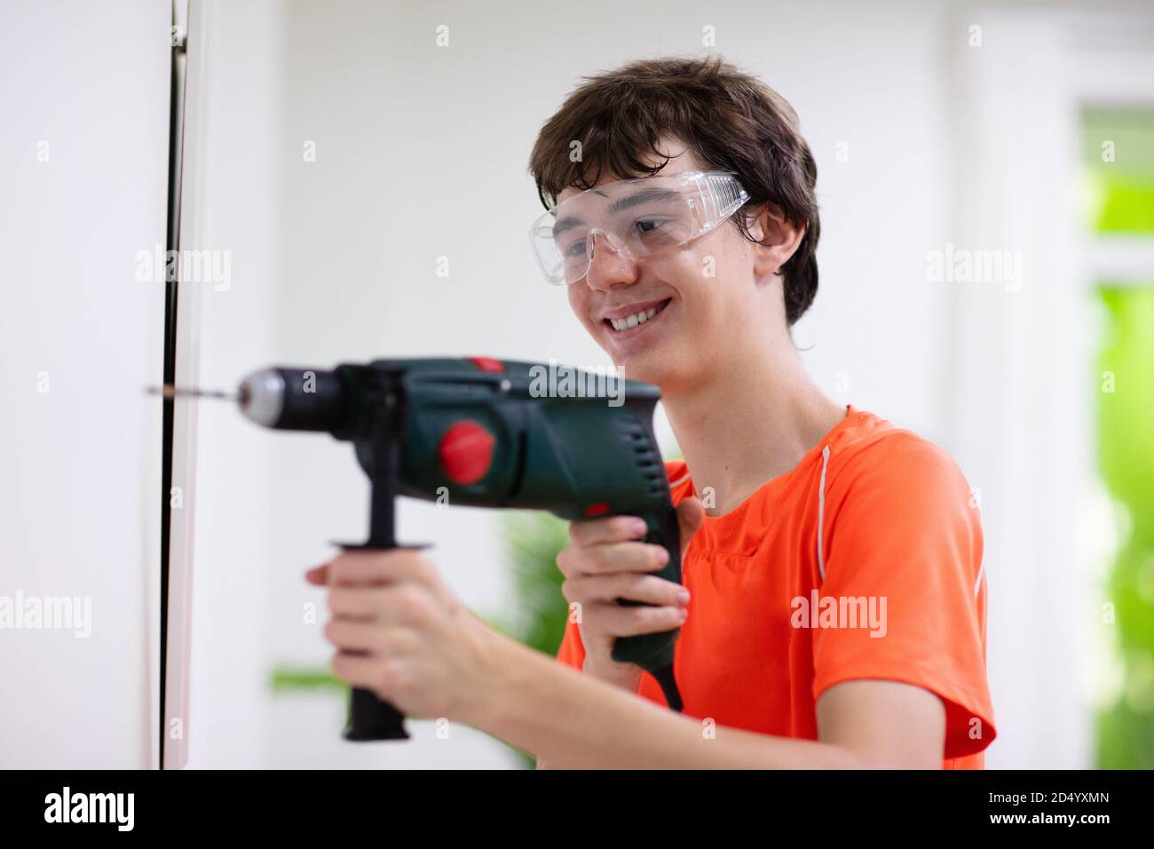 Boy drill machine hi-res stock photography and images - Alamy