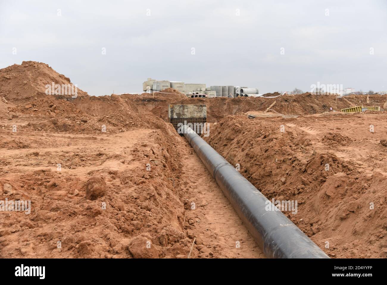 Laying drain pipes and concrete manholes for stormwater system ...