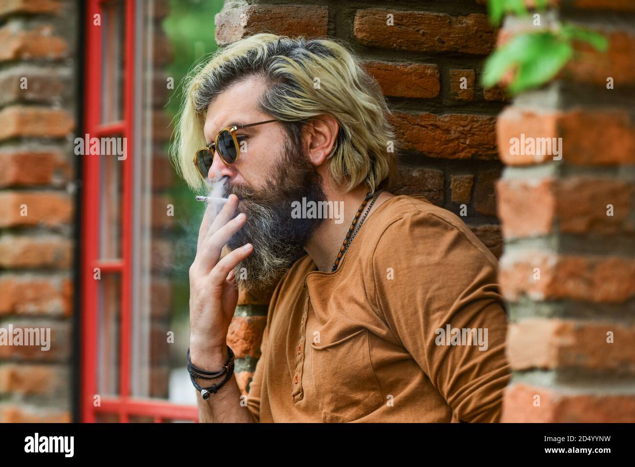 Cool handsome smoking brutal hi-res stock photography and images - Alamy