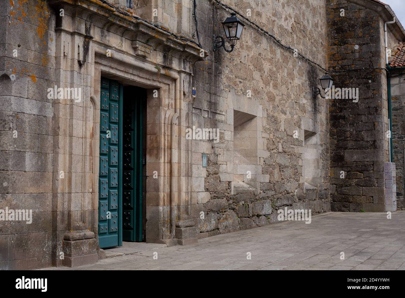 Melide, Galicia, Spain - 09/23/2020: Iglexa de San Pedro doorway in the ...