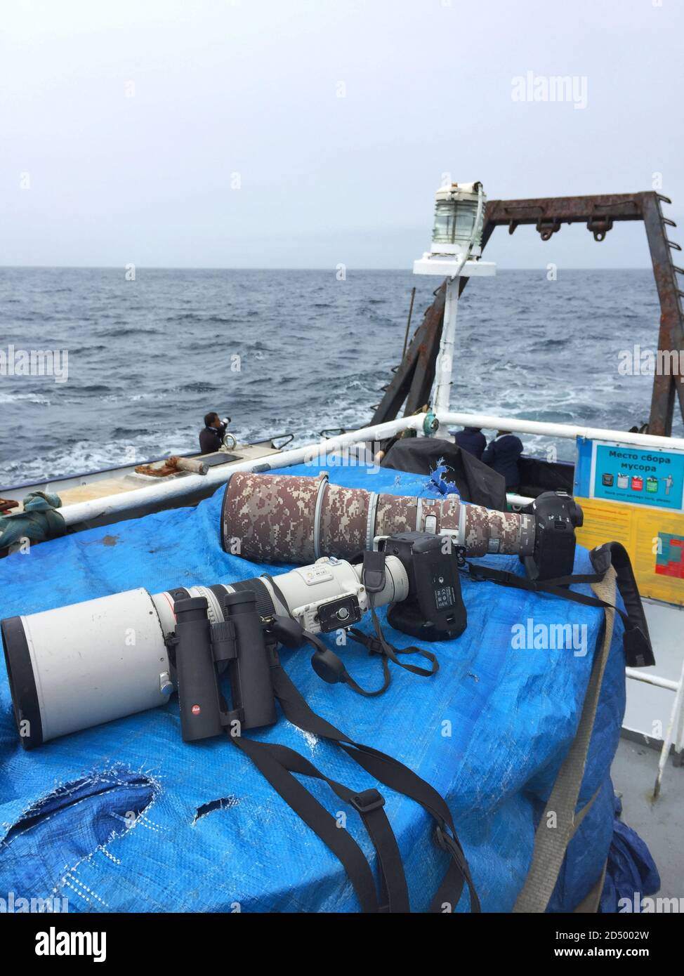 Camera gear lying around on the stern of expedition cruise ship Spirit ...