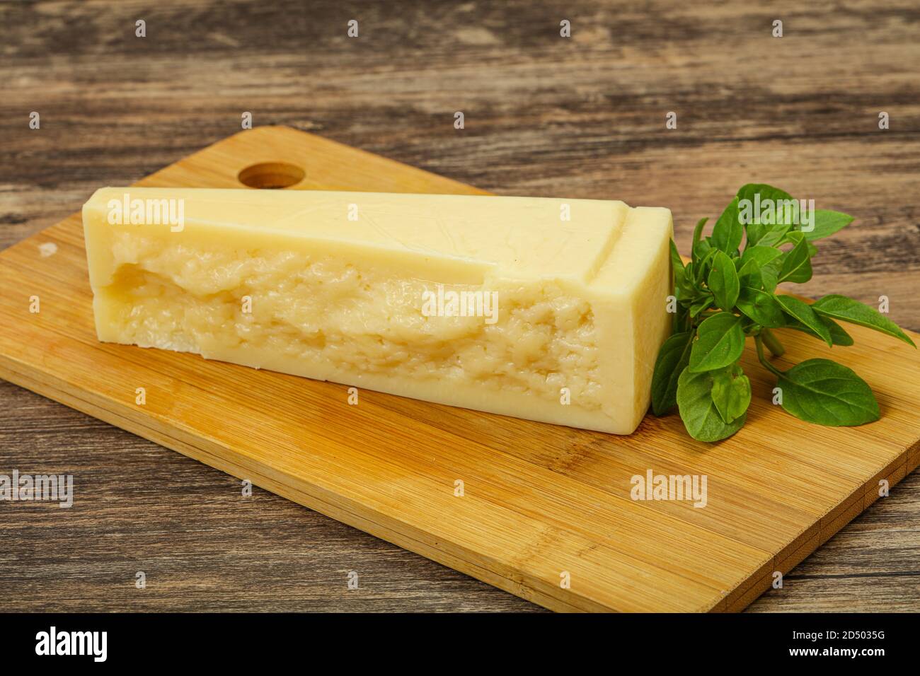 Hard parmesan cheese served basil leaves Stock Photo - Alamy