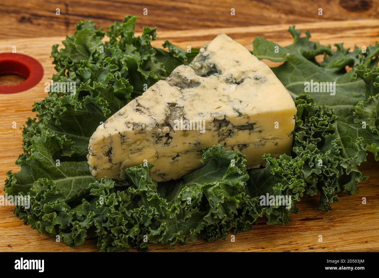 Dairy Blue cheese triangle with mold Stock Photo - Alamy