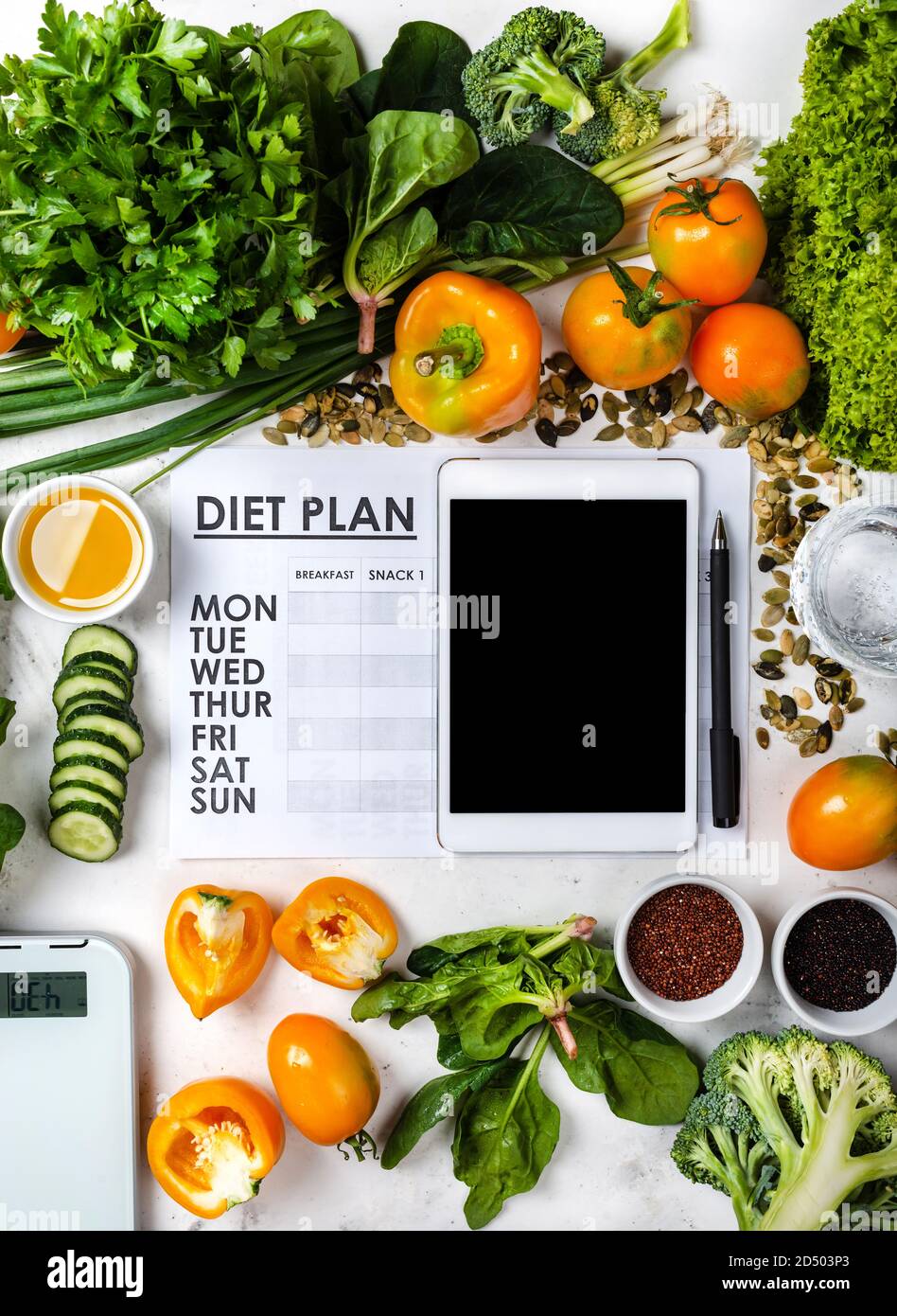 Lose weight concept. Tablet computer Diet plan and set of healthy food ...