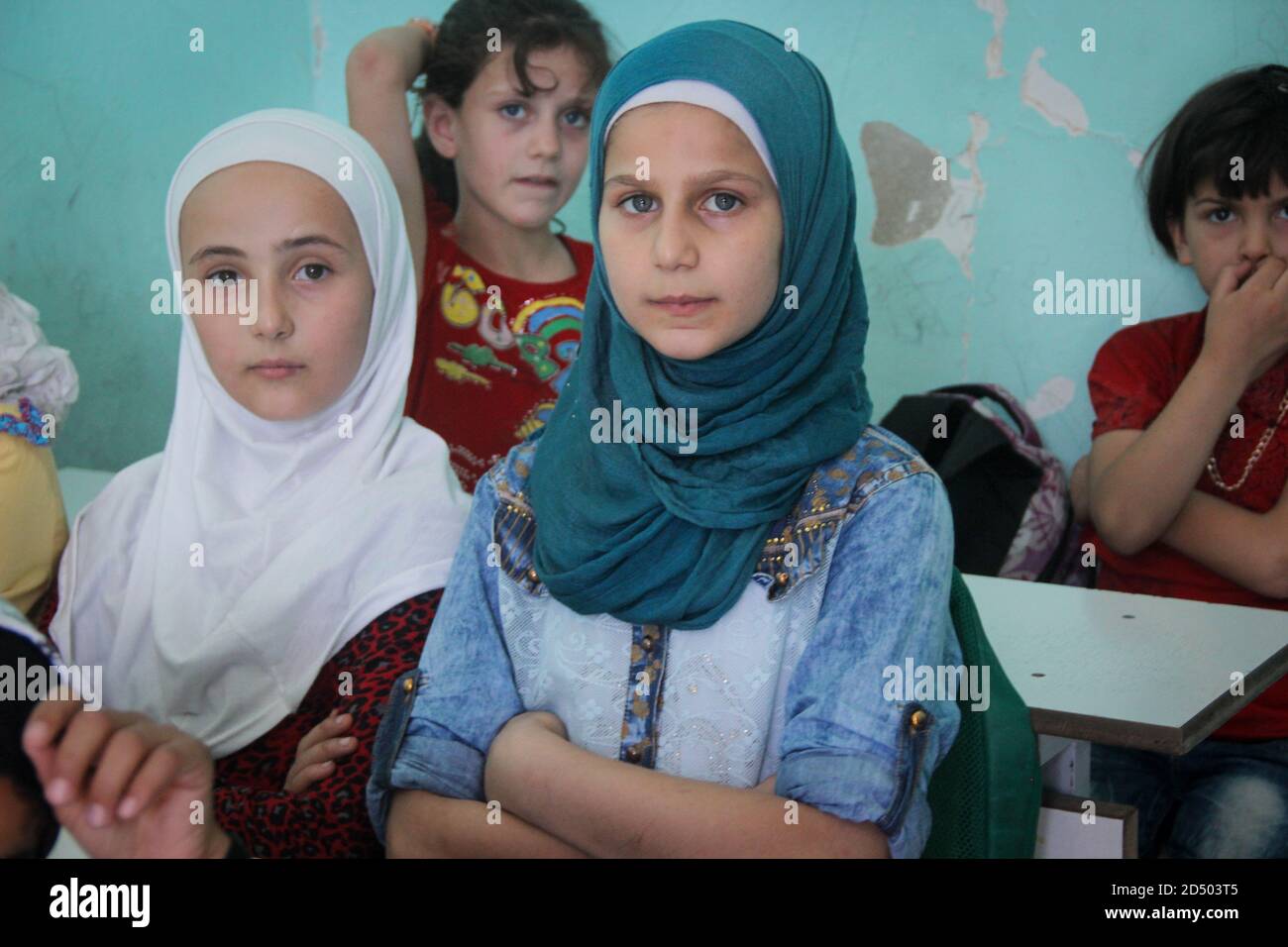 Syrian refugee children inside a school. war in Syria Stock Photo - Alamy