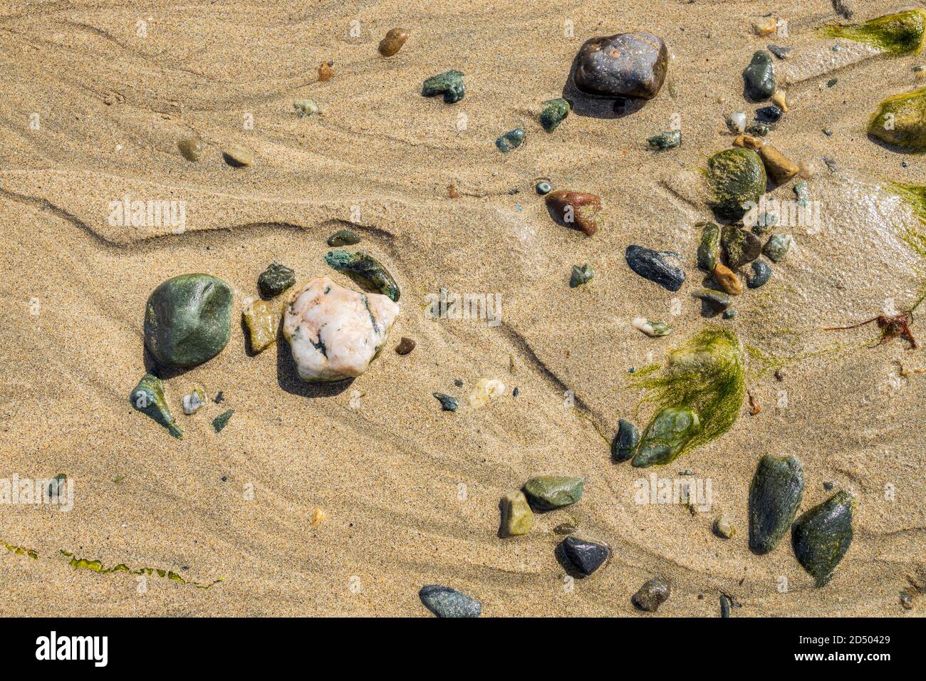 Overhead close up detail of the beach, sand and stones at Old Head ...