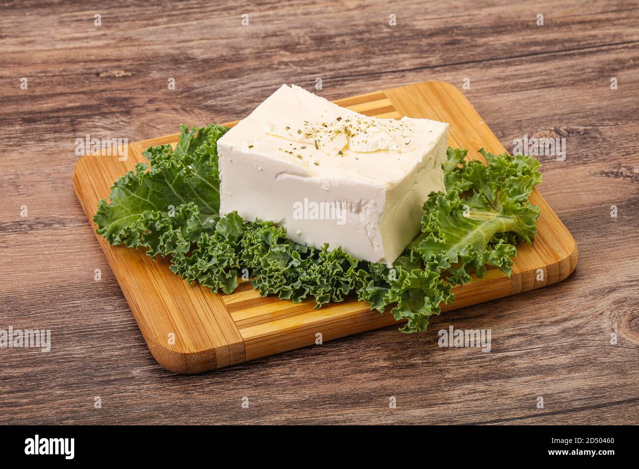Traditional tasty Greek Feta soft cheese brick Stock Photo - Alamy