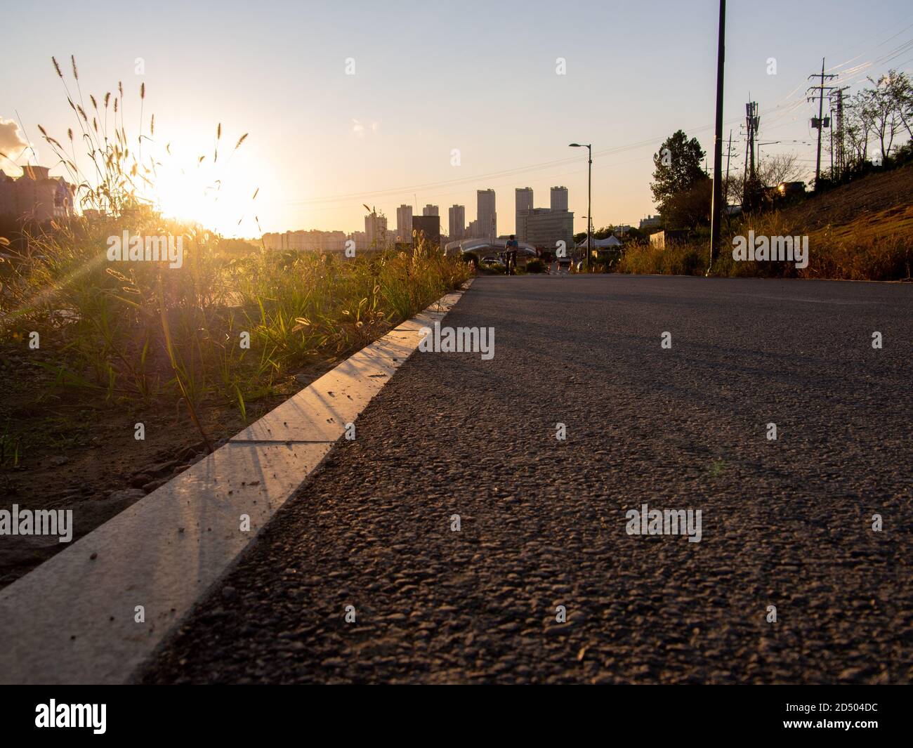 Asphalt bike path yellow hi-res stock photography and images - Alamy