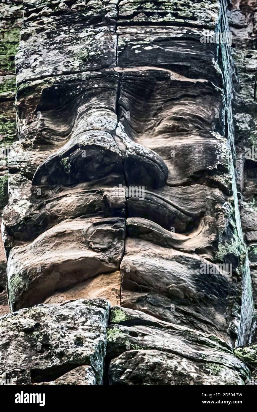 Stone bas relief smiling Buddha face Stock Photo - Alamy