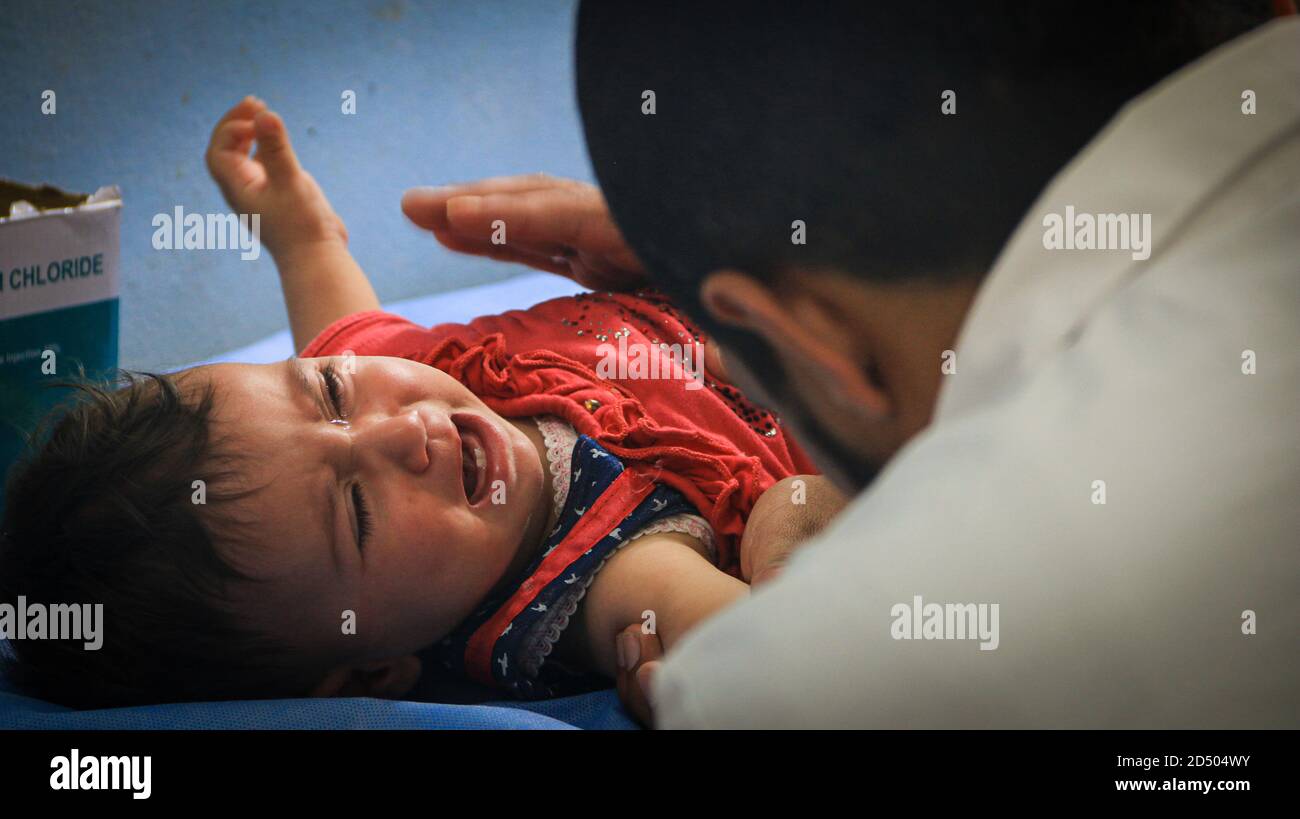A child cries for fear of treatment .. A child is afraid of the doctor ...
