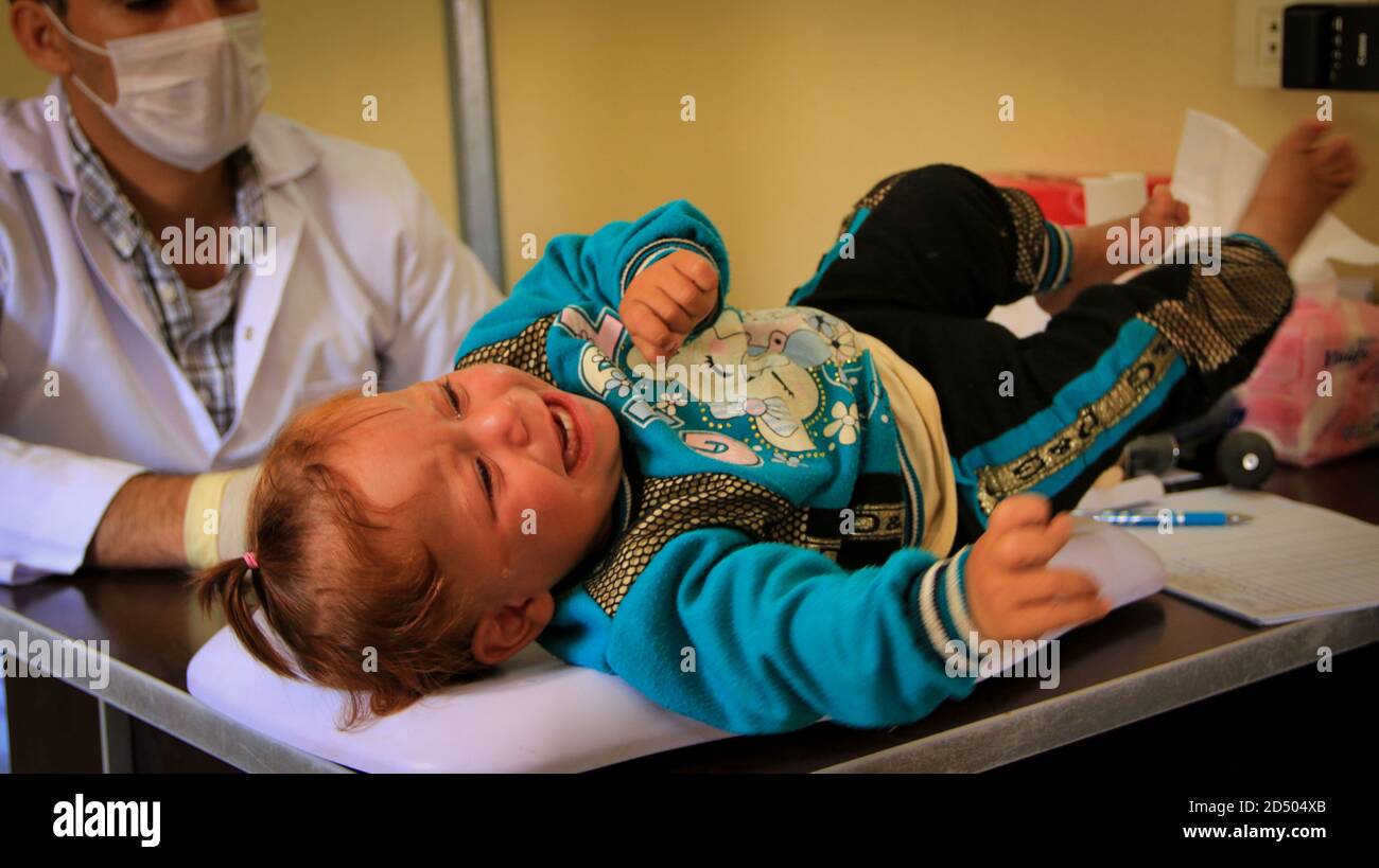 A child cries for fear of treatment .. A child is afraid of the doctor ...