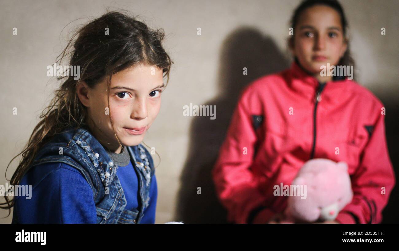 tired child, a sad child's face, sick children waiting to enter the ...
