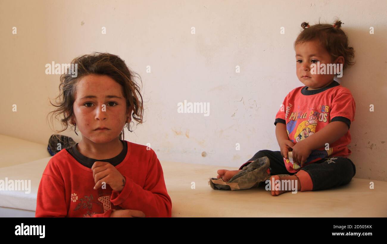 tired child, a sad child's face, sick children waiting to enter the ...